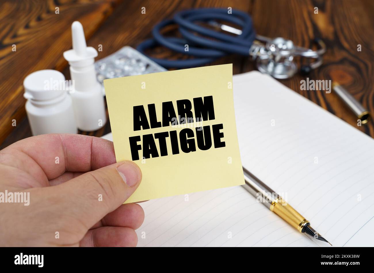 Medical concept. On the table is a notebook, medicines and a ...