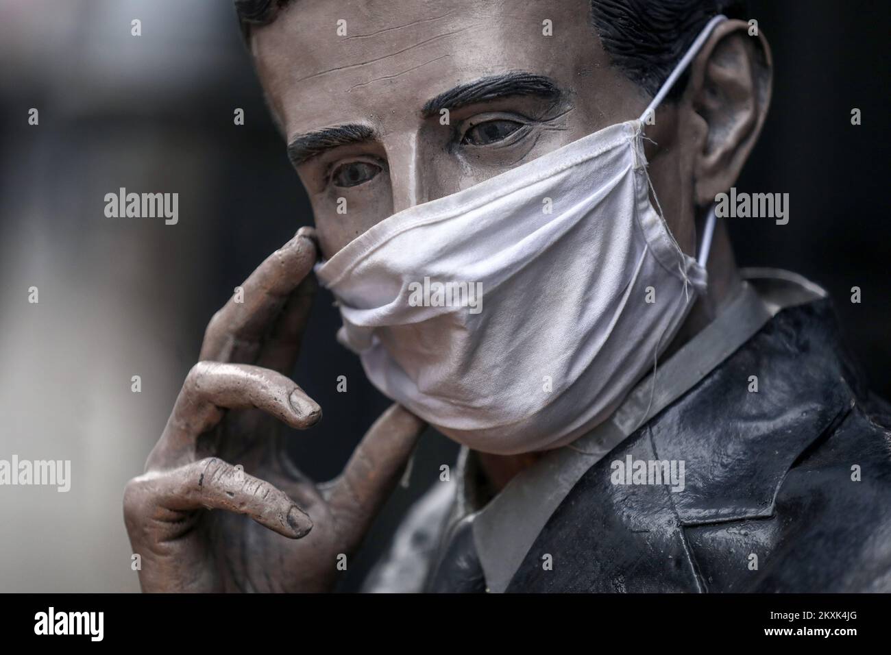 Scientist Nikola Tesla statue wearing safety mask during COVID-19 in ...