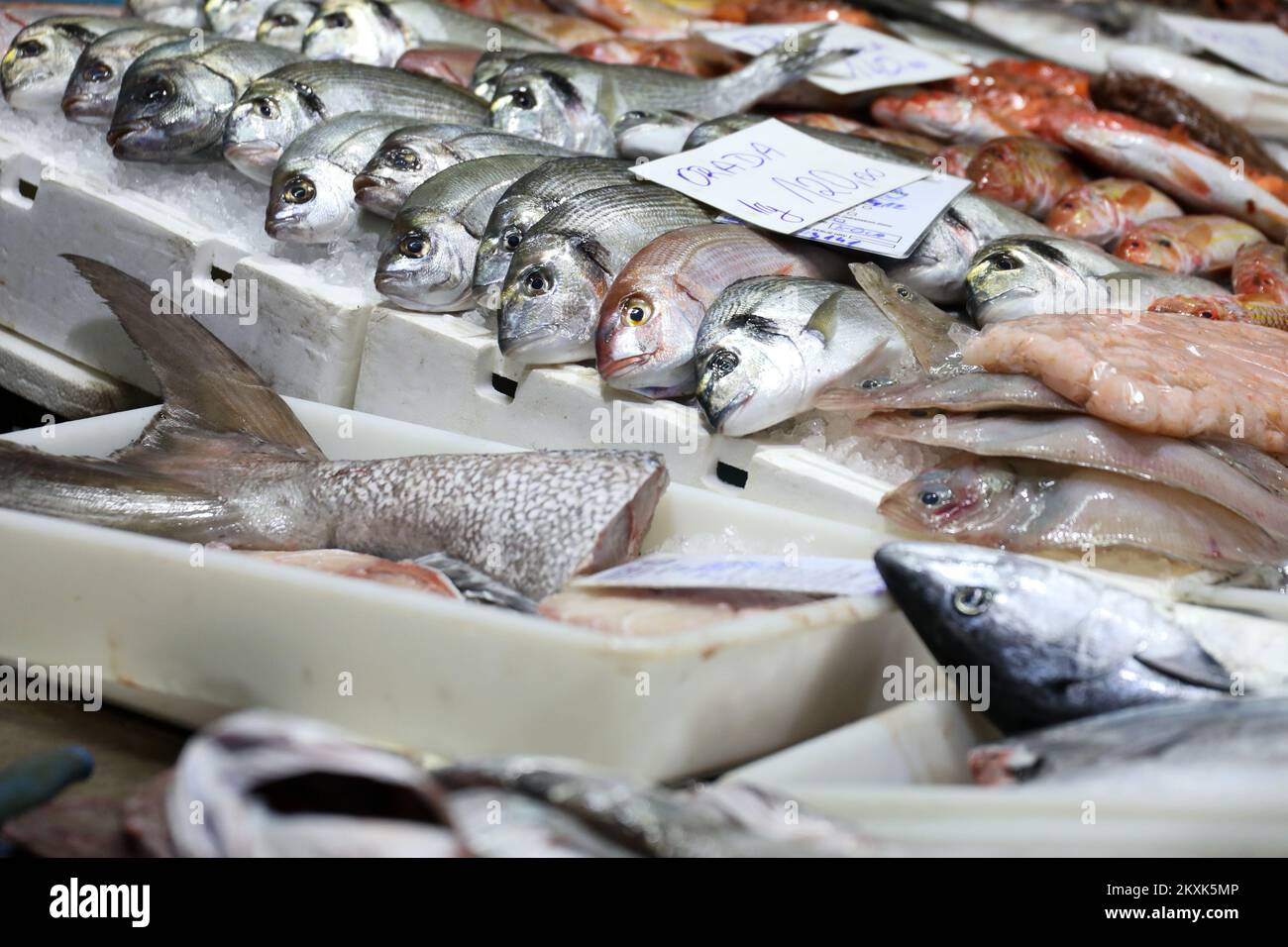 People buy fishes at a fish market Dolac on Christmas Eve in Zagreb ...