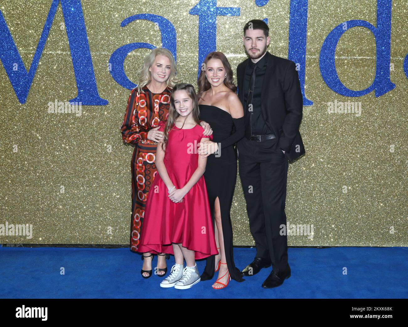 London, UK. Alisha Weir (red dress) and family at the gala screening of ...