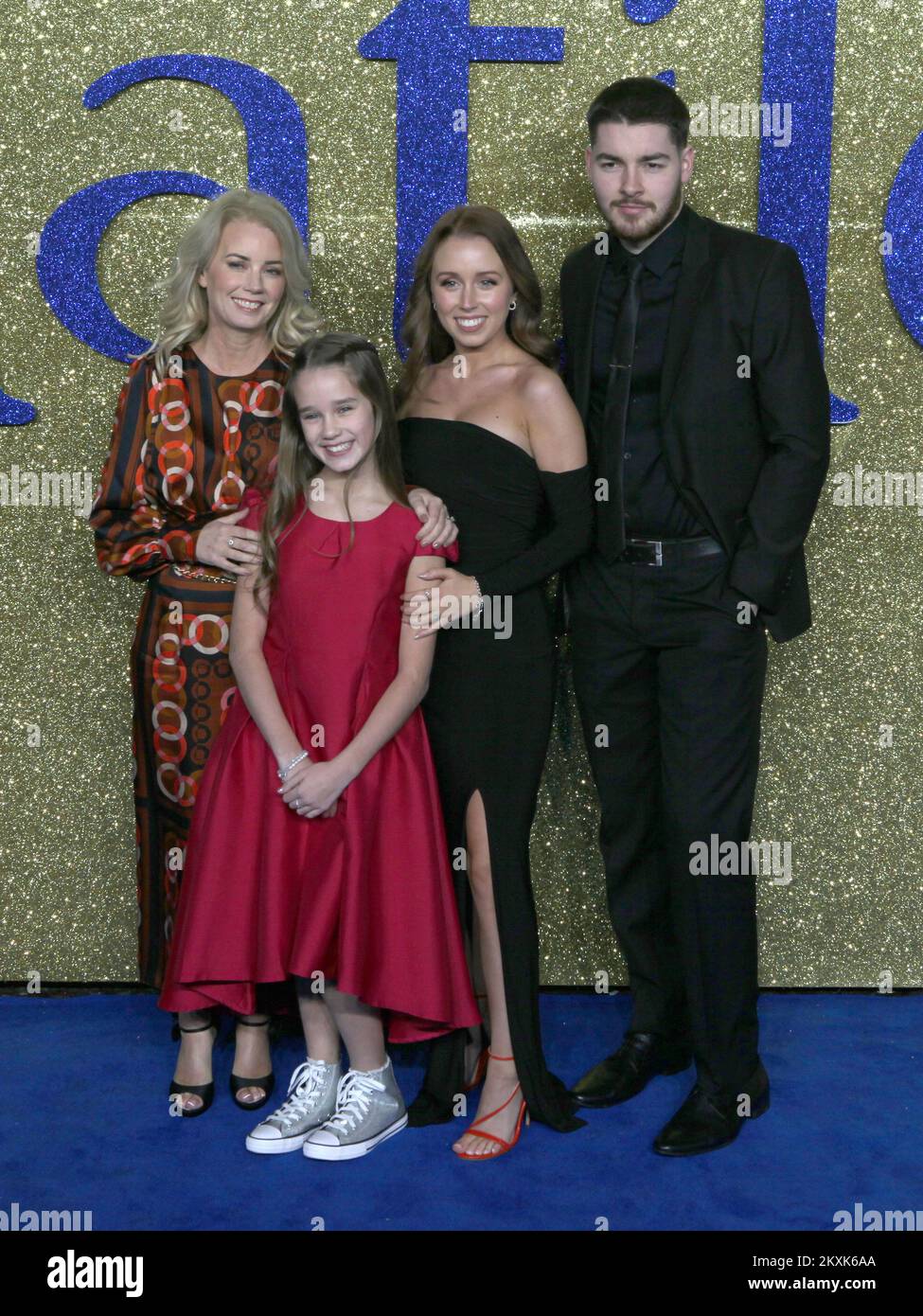 London, UK. Alisha Weir (red dress) and family at the gala screening of ...