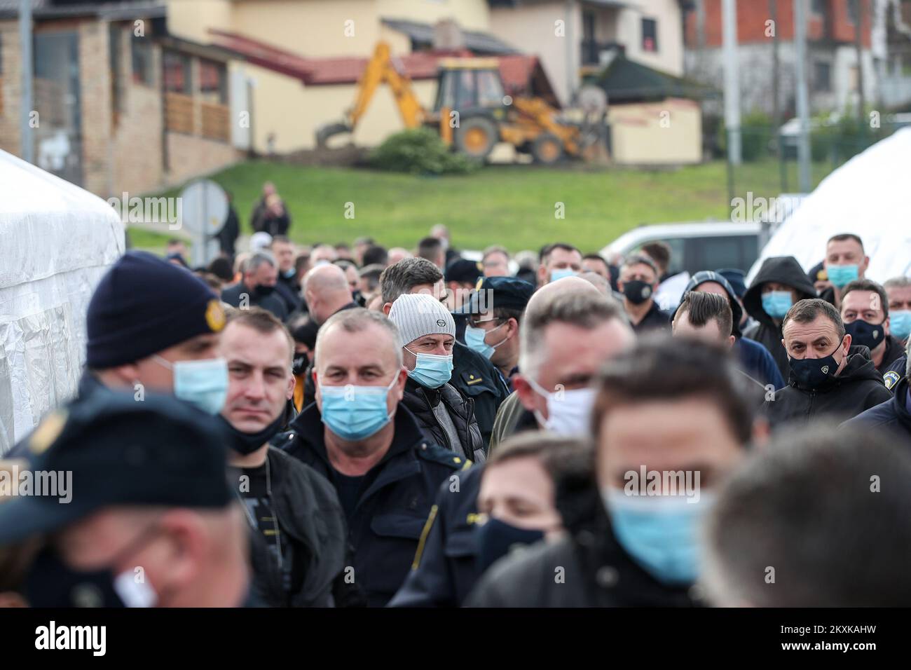Emergency service workers wait for COVID-19 vaccination, in Petrinja ...