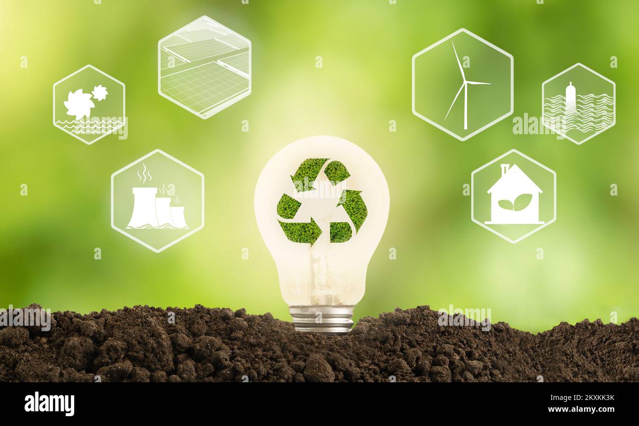 Shining bulb with recycle icon and energy resource icons as a symbol of ...