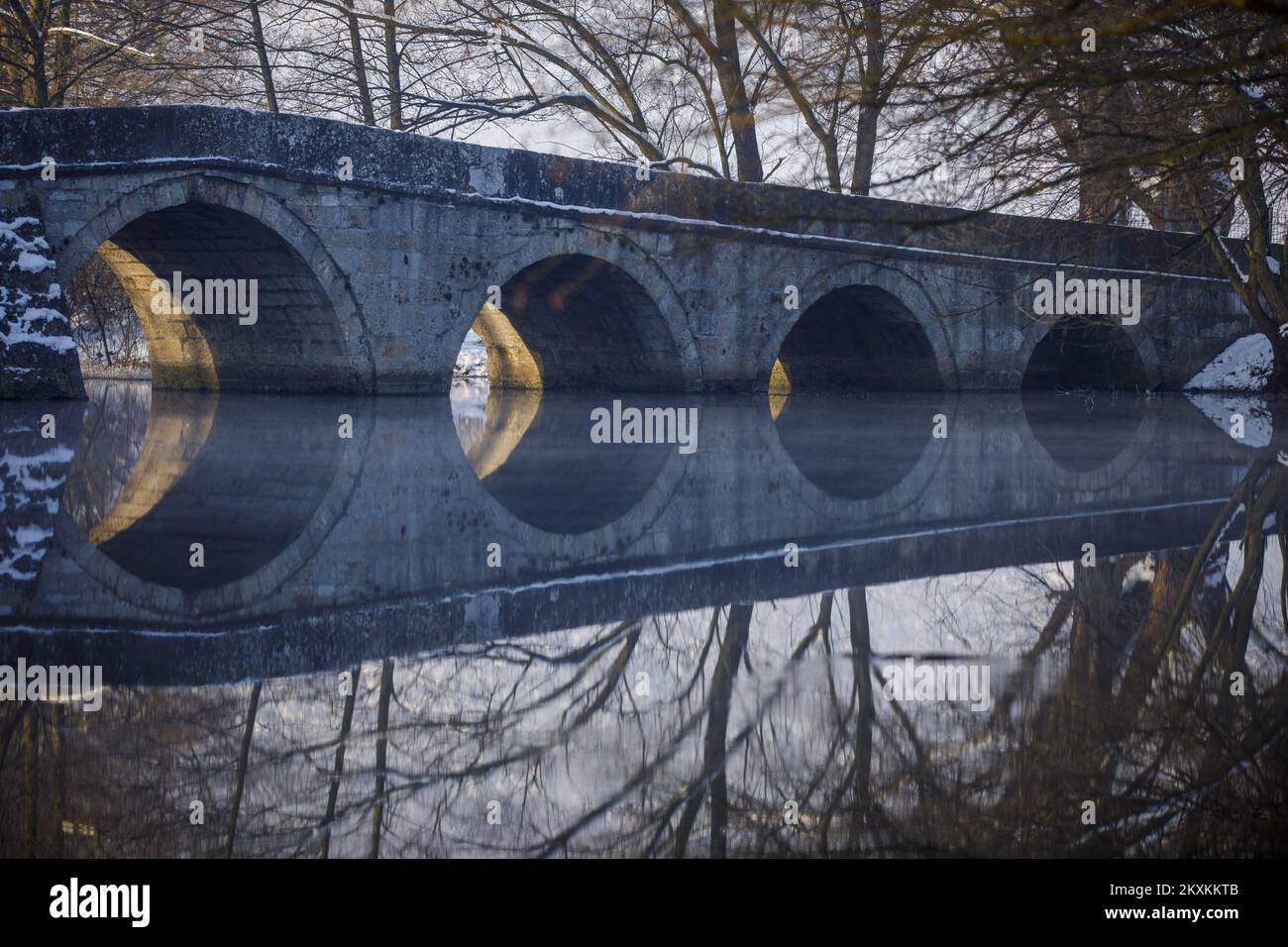 Photo taken on Jan. 20, 2021 shows the Roman bridge in cold winter ...