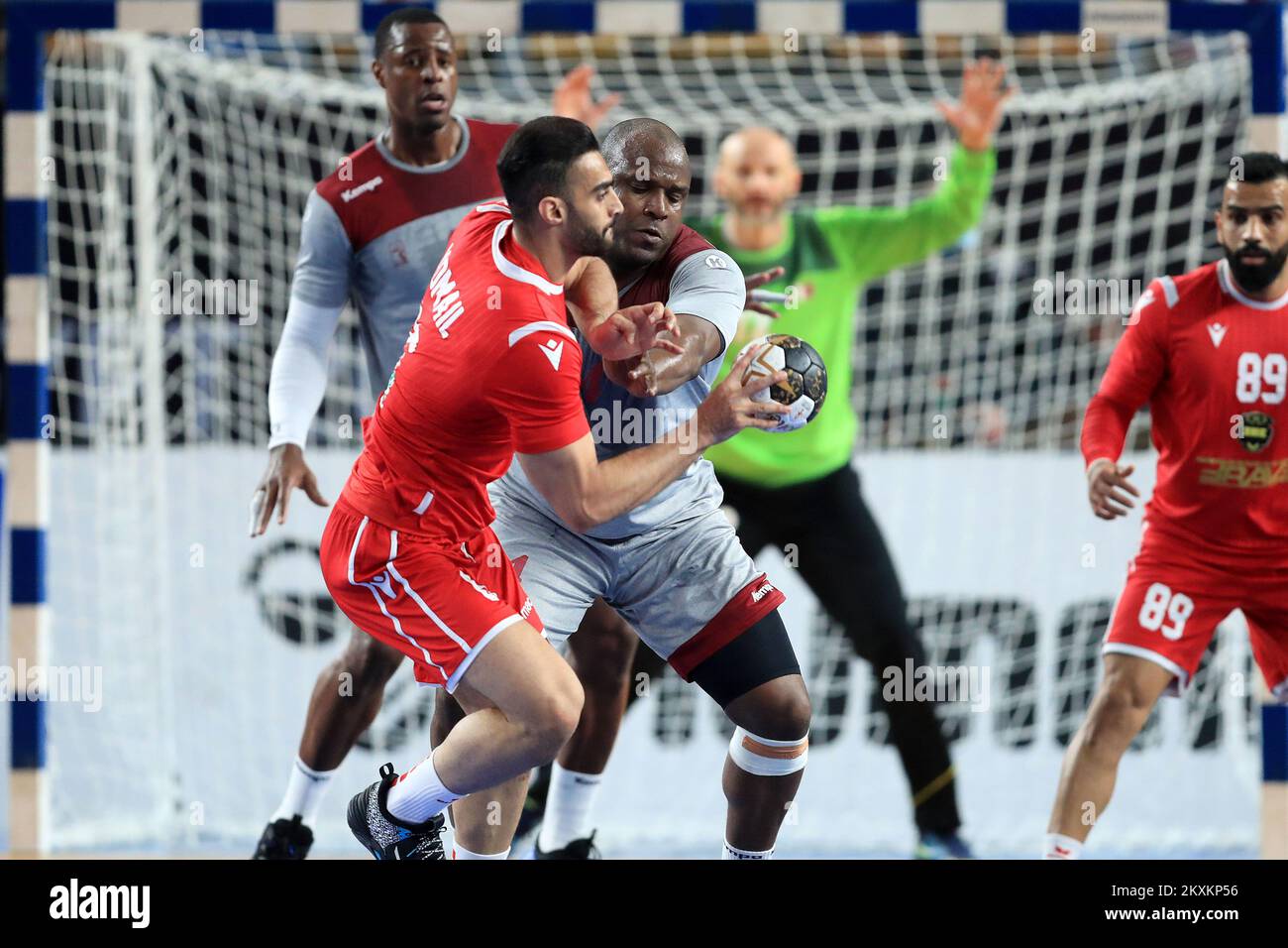 CAIRO, EGYPT - JANUARY 23: Komail Mahfoodh of Bahrain and Hassan ...