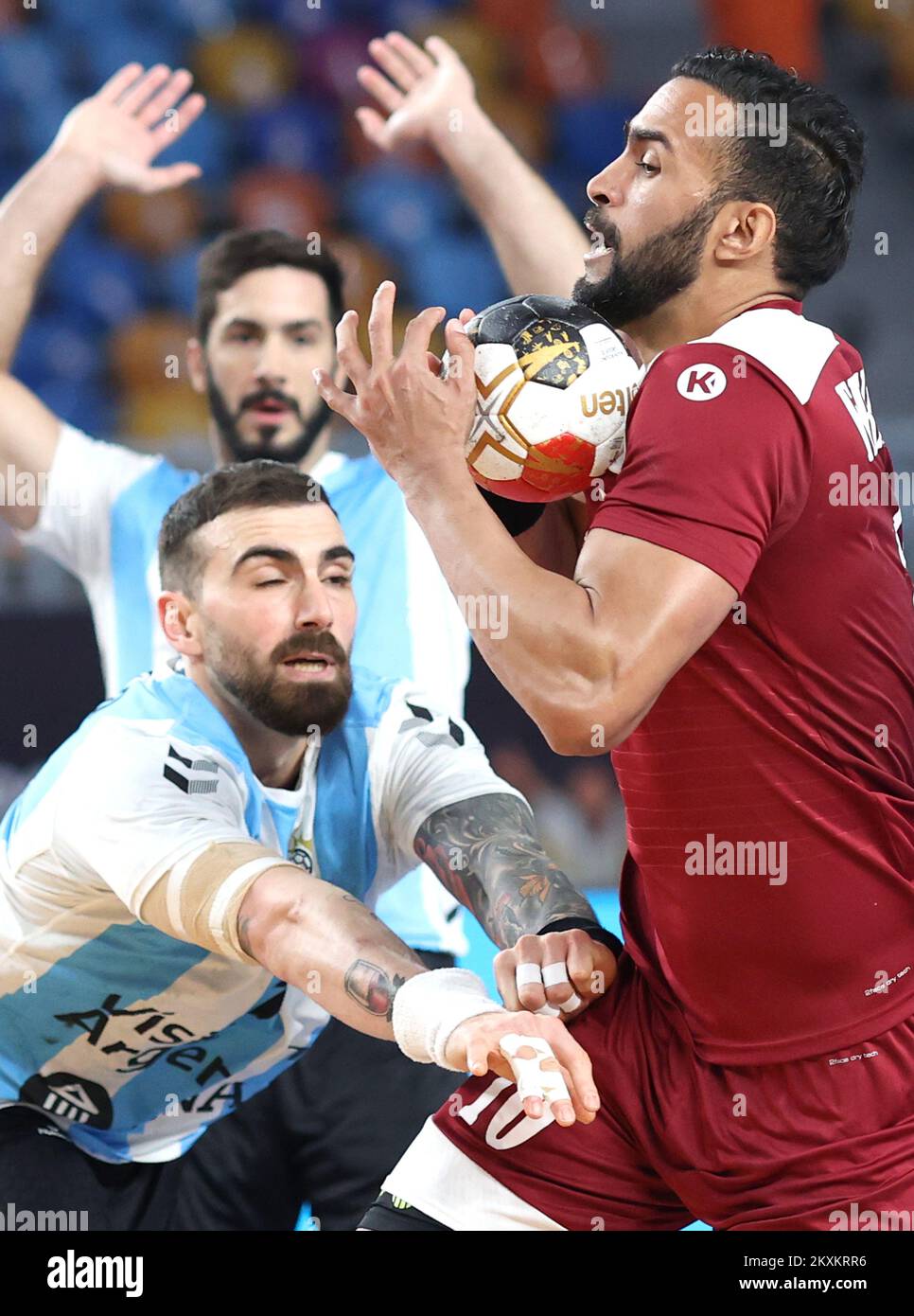 CAIRO, EGYPT - JANUARY 25: Frankis Carol of Qatar and Lucas Moscariello of Argentina during the ...