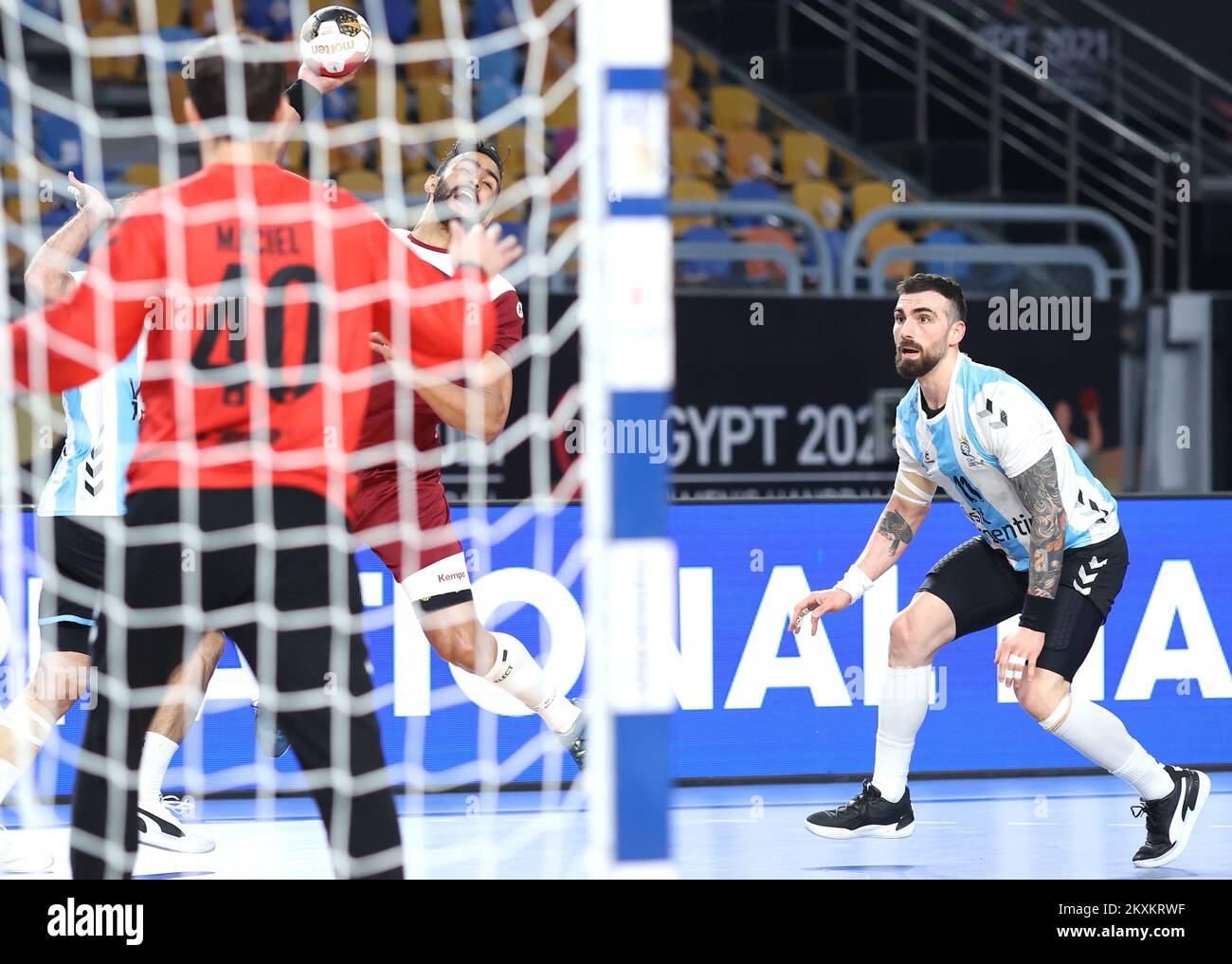 CAIRO, EGYPT - JANUARY 25: Frankis Carol of Qatar and Lucas Moscariello of Argentina during the ...