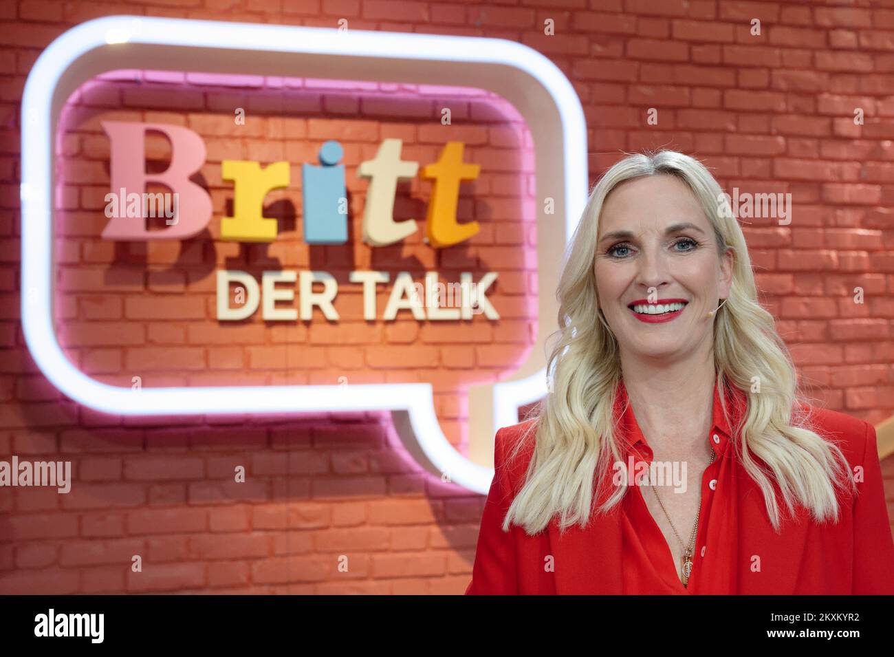 30 November 2022, North Rhine-Westphalia, Hürth: Host Britt Hagedorn stands in the studio after ...