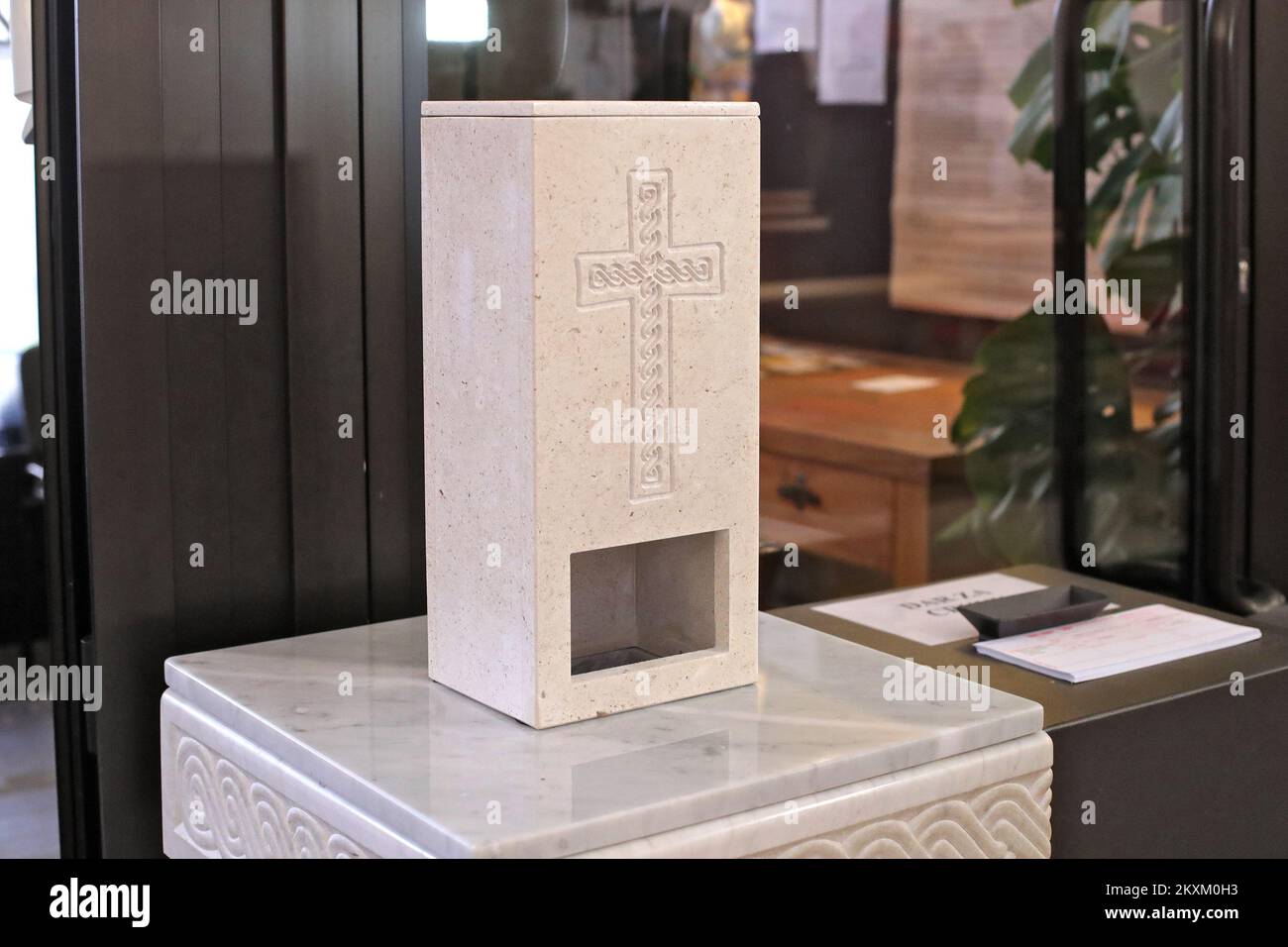 Holy water dispenser hi-res stock photography and images - Alamy