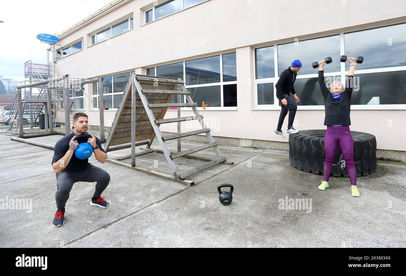 The pictures show people exercising on the concrete in front of the gym ...