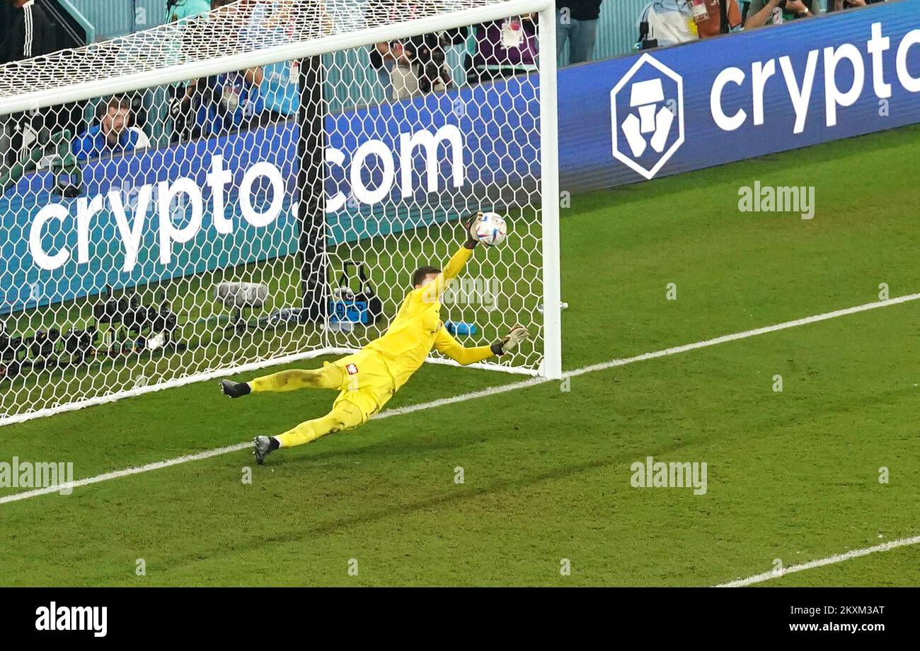 Poland goalkeeper Wojciech Szczesny saves a penalty from Argentina's ...