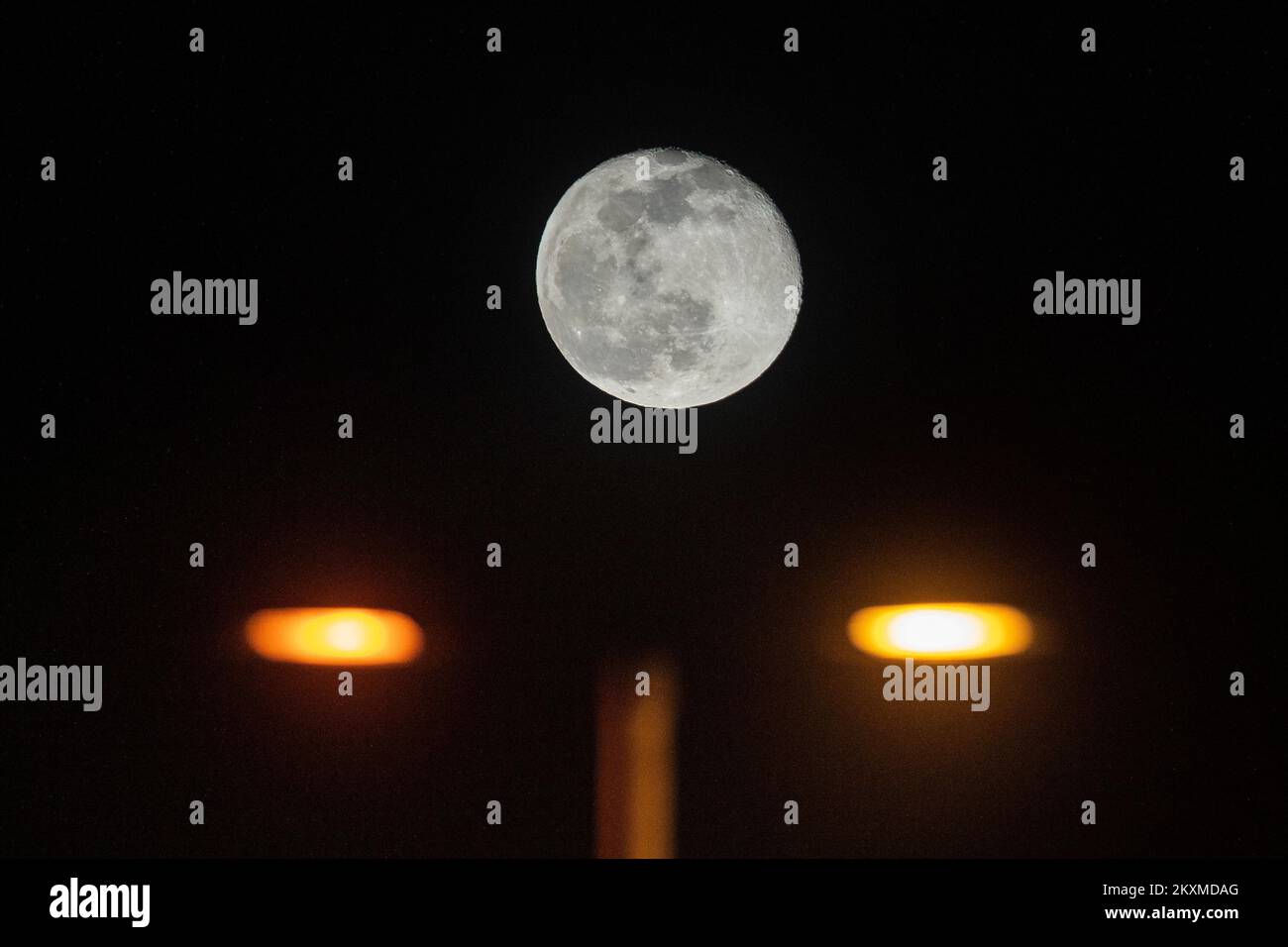 Full moon is seen above Pula, Croatia on February 28, 2021 Photo ...