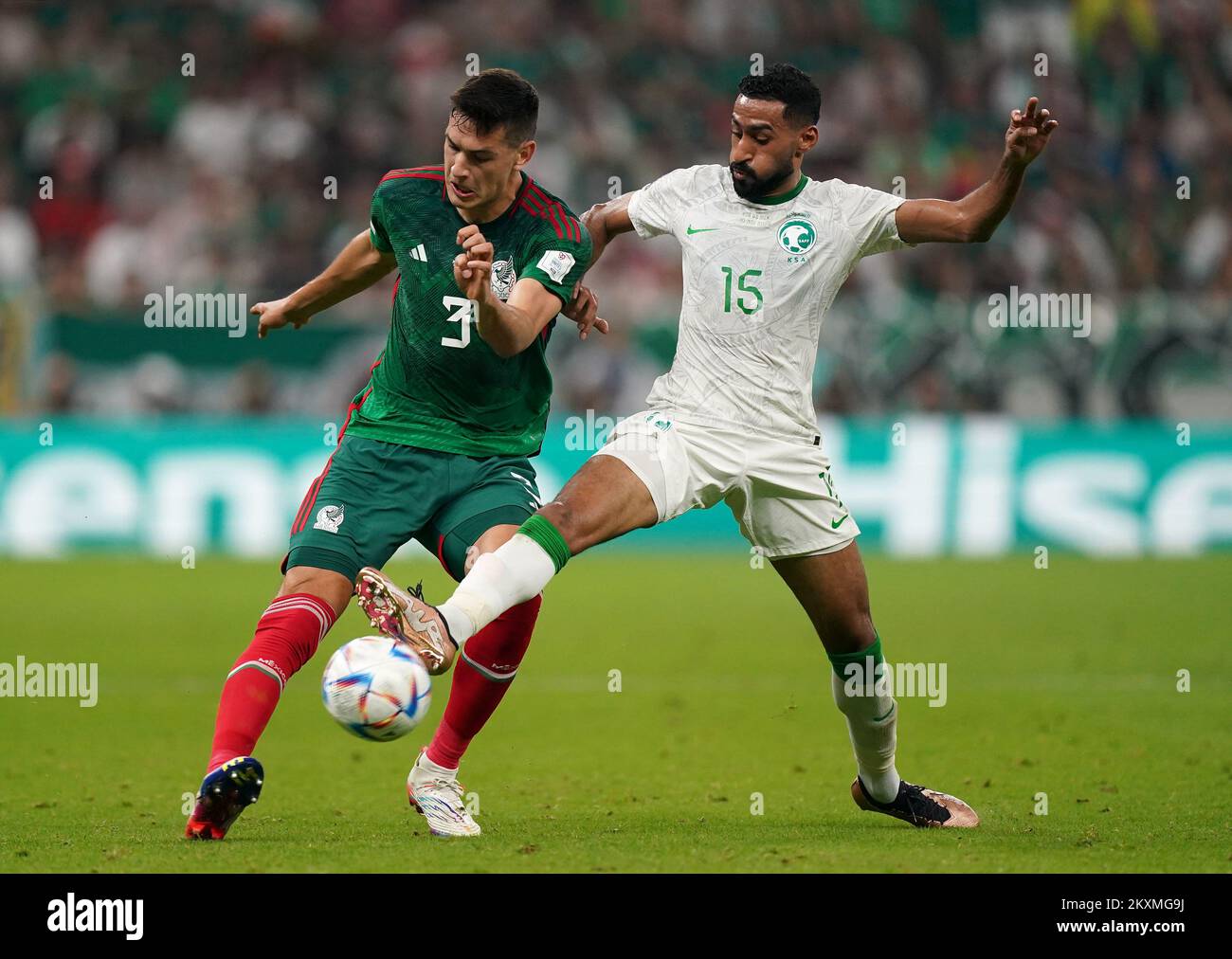 Mexico's Cesar Montes (left) and Saudi Arabia's Ali Al-Hassan during ...
