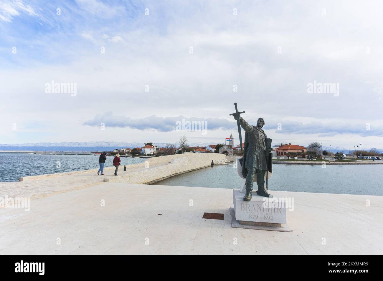 The pictures show the foot of the monument to St. Gregory of Nin with a ...