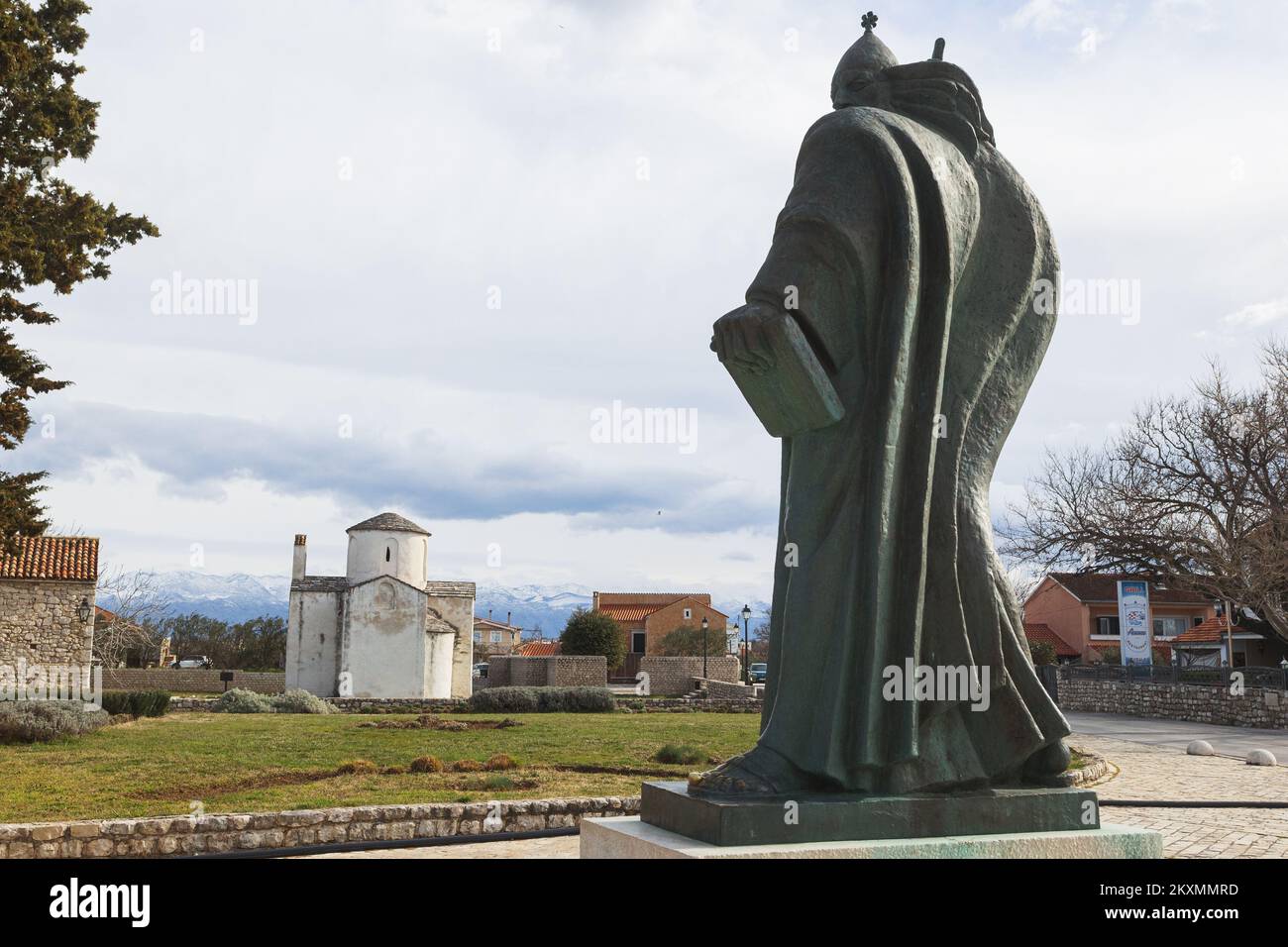 The pictures show the foot of the monument to St. Gregory of Nin with a ...