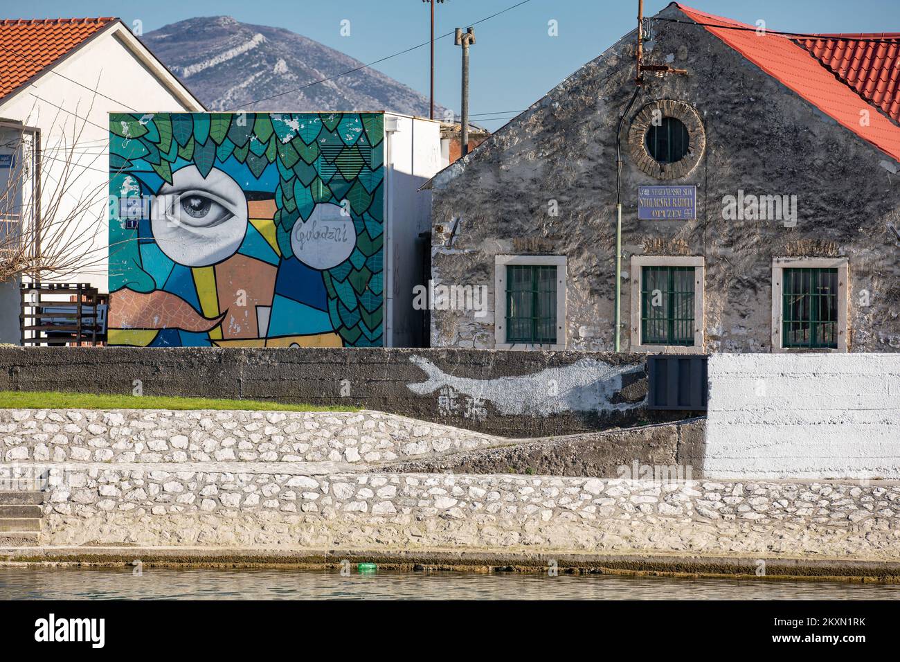 A graffiti is seen on a wall as part of "Zen Opuzen" art festival in ...