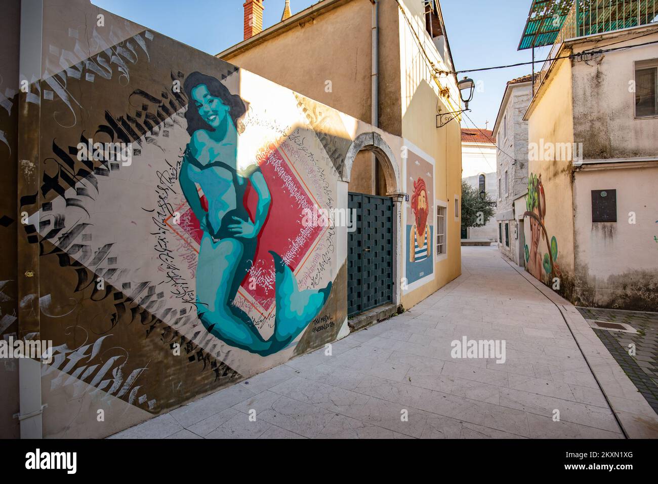 A graffiti is seen on a wall as part of "Zen Opuzen" art festival in ...