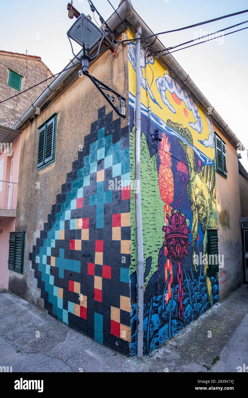 A graffiti is seen on a wall as part of "Zen Opuzen" art festival in ...