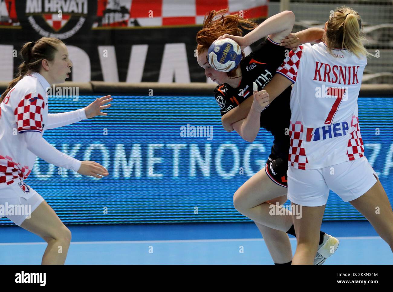 Dione Housheer of Netherlands is challenged by Dora Krsnik of Croatia ...
