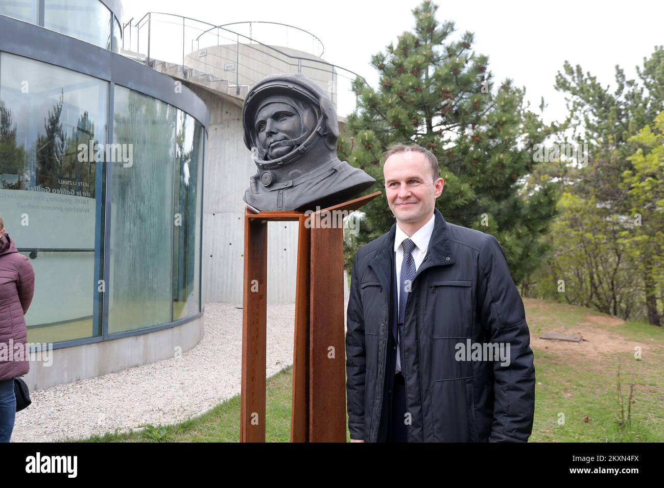 Russian cosmonaut Sergey Ryazansky pose for photo at the monument to ...