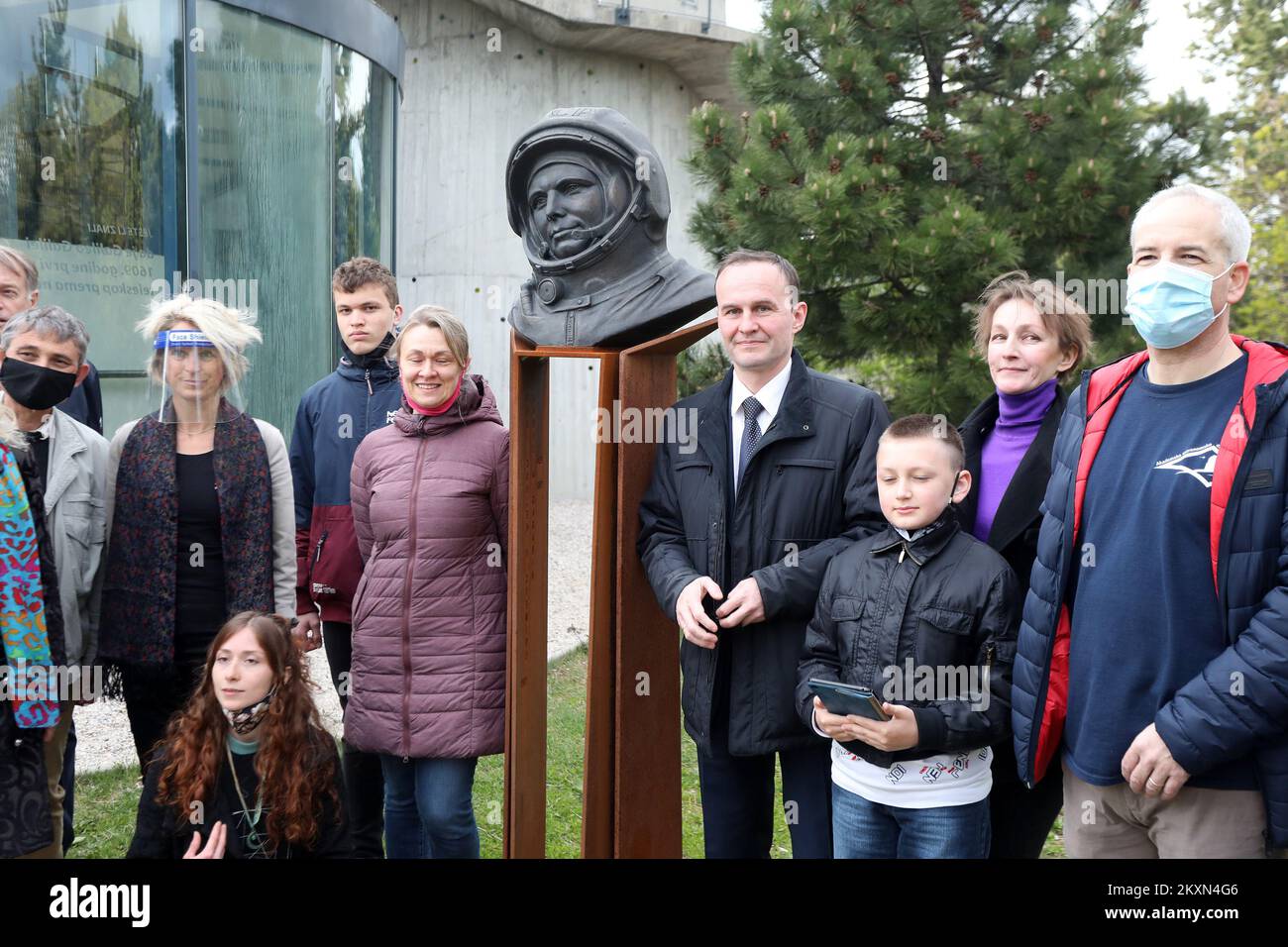 Russian cosmonaut Sergey Ryazansky pose for photo at the monument to ...