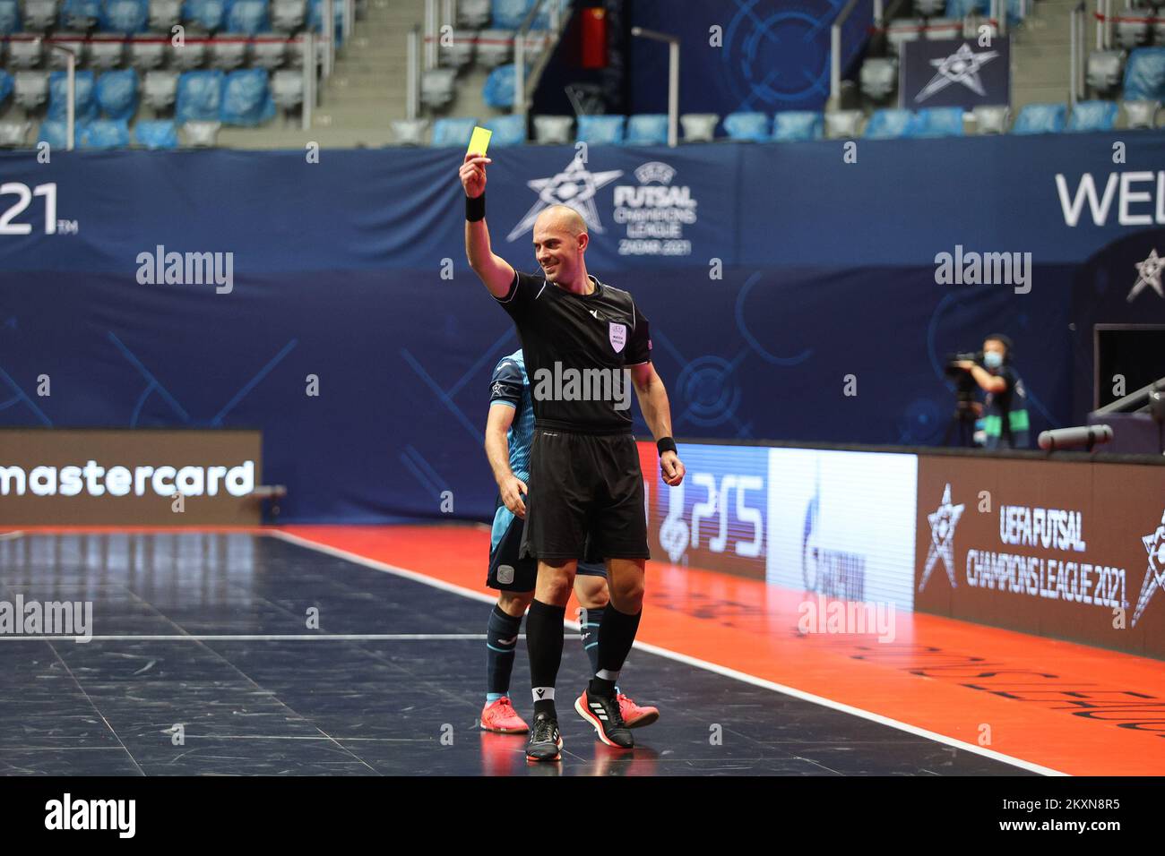 First Referee Angelo Galante of Italy show the yellow card during UEFA ...