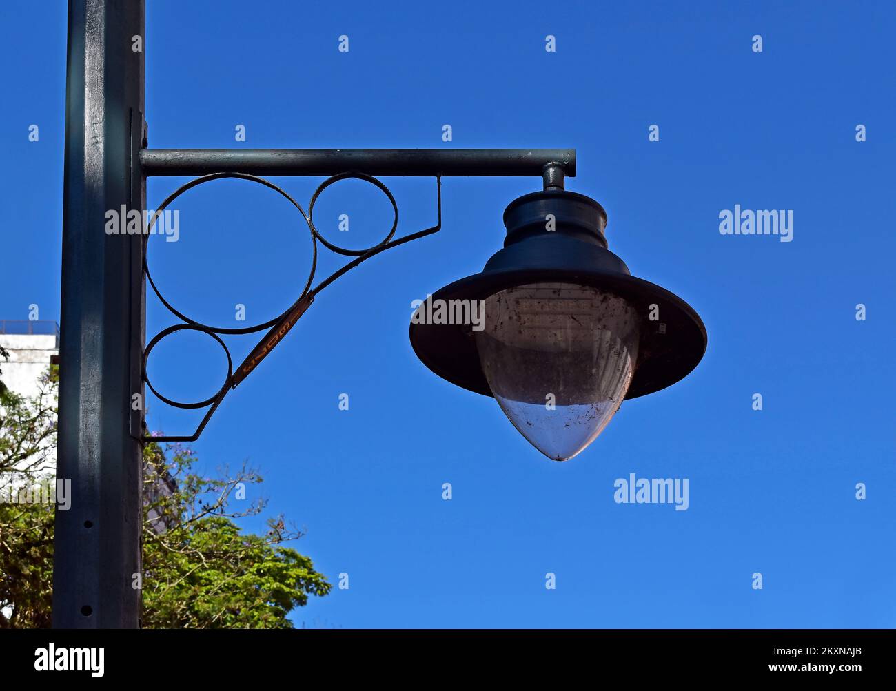 Decorative lamp post against blue sky hi-res stock photography and ...