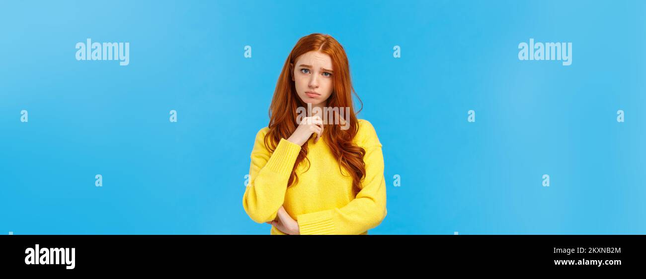 Upset redhead girl showing empathy, pity for friend hearing sad news ...