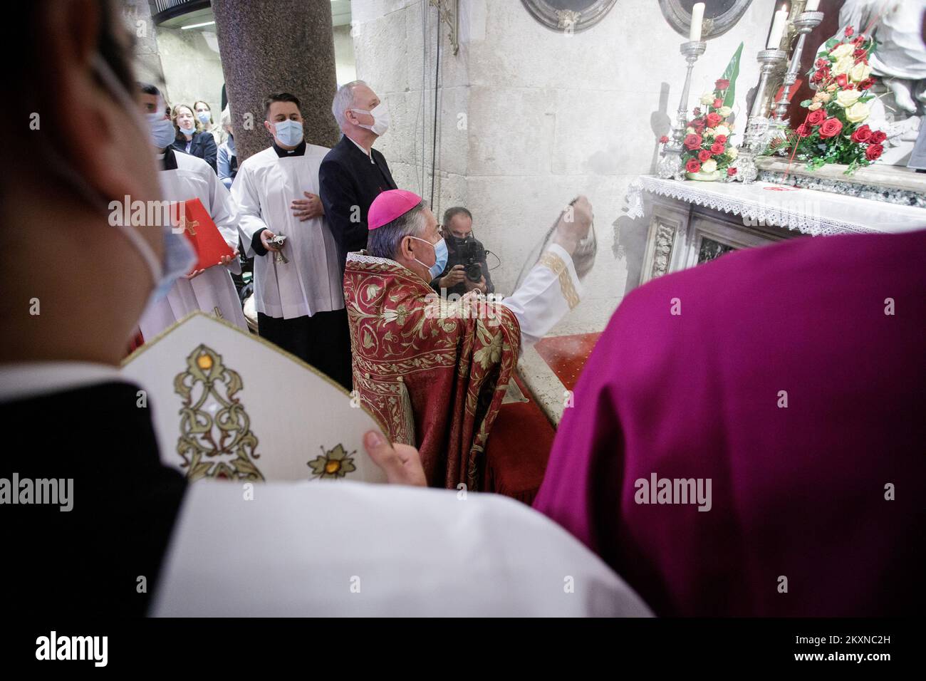 A priest is pictured during traditional presentation of St. Domnius ...
