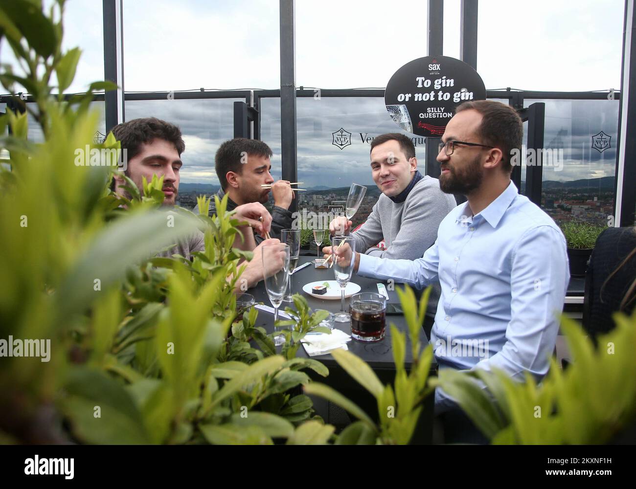 People are seen in the Rooftop Lateral restaurant at Strojarska Street ...