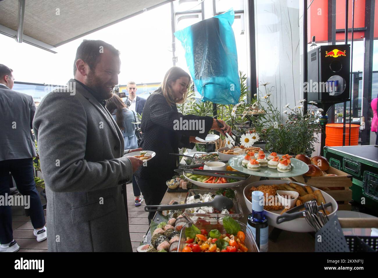 People are seen in the Rooftop Lateral restaurant at Strojarska Street ...