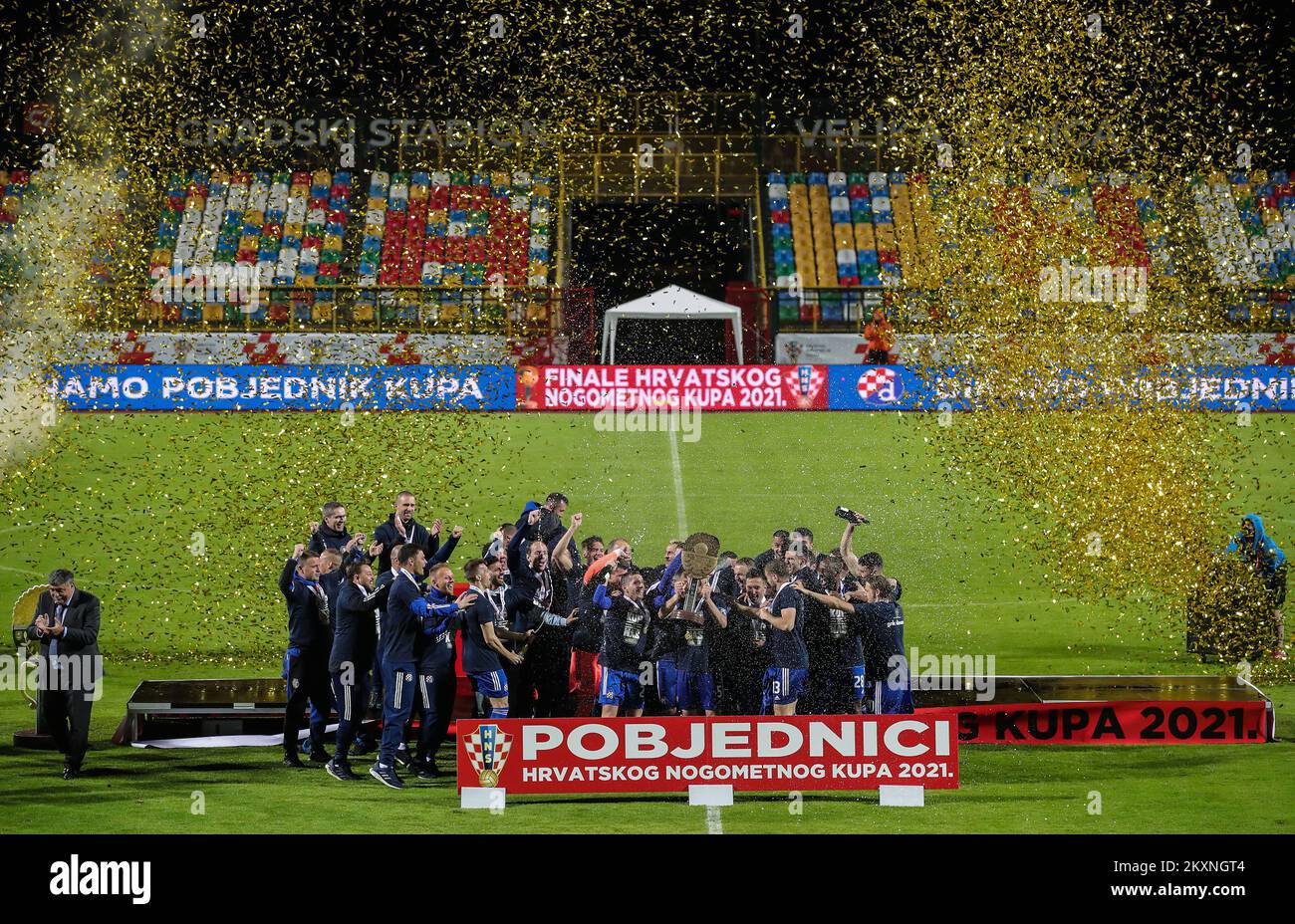 Football players of Dinamo Zagreb with medals and a cup celebrate after ...