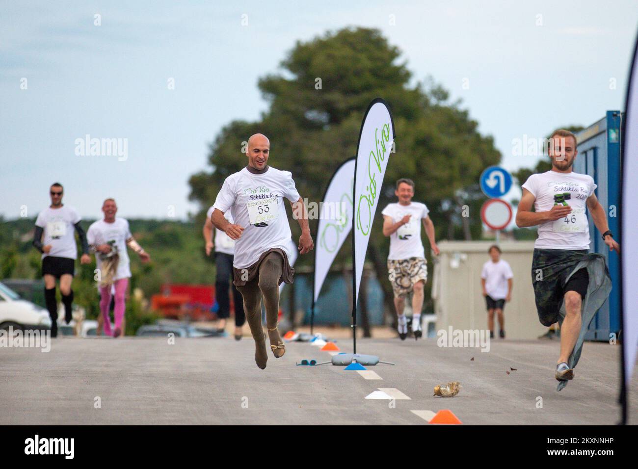 Traditional high heels race was held on the road in Vodnjan, Croatia on ...