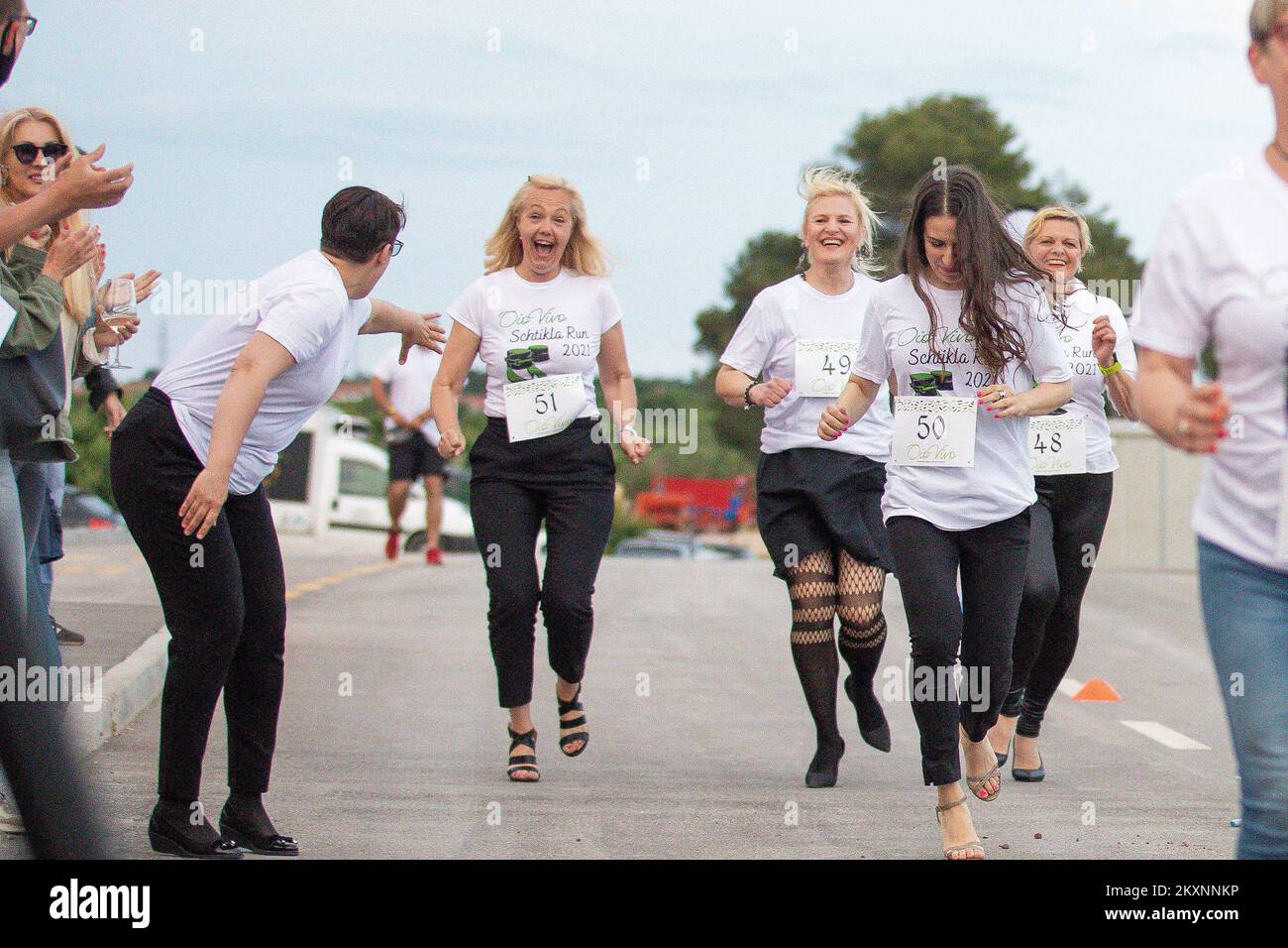 Traditional high heels race was held on the road in Vodnjan, Croatia on ...