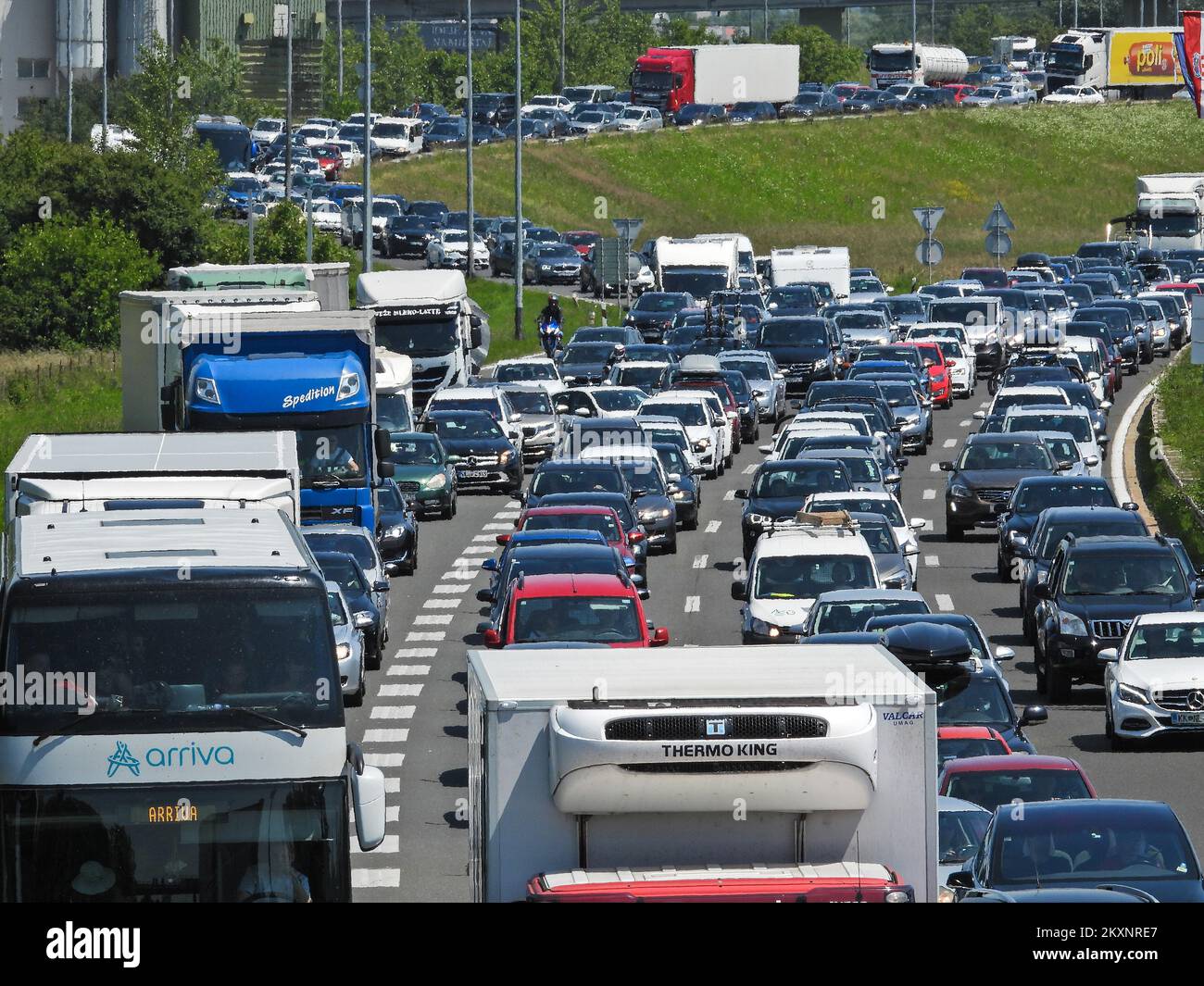 Cars line up in long tracffic jam to enter the A1 Croatia highway at ...