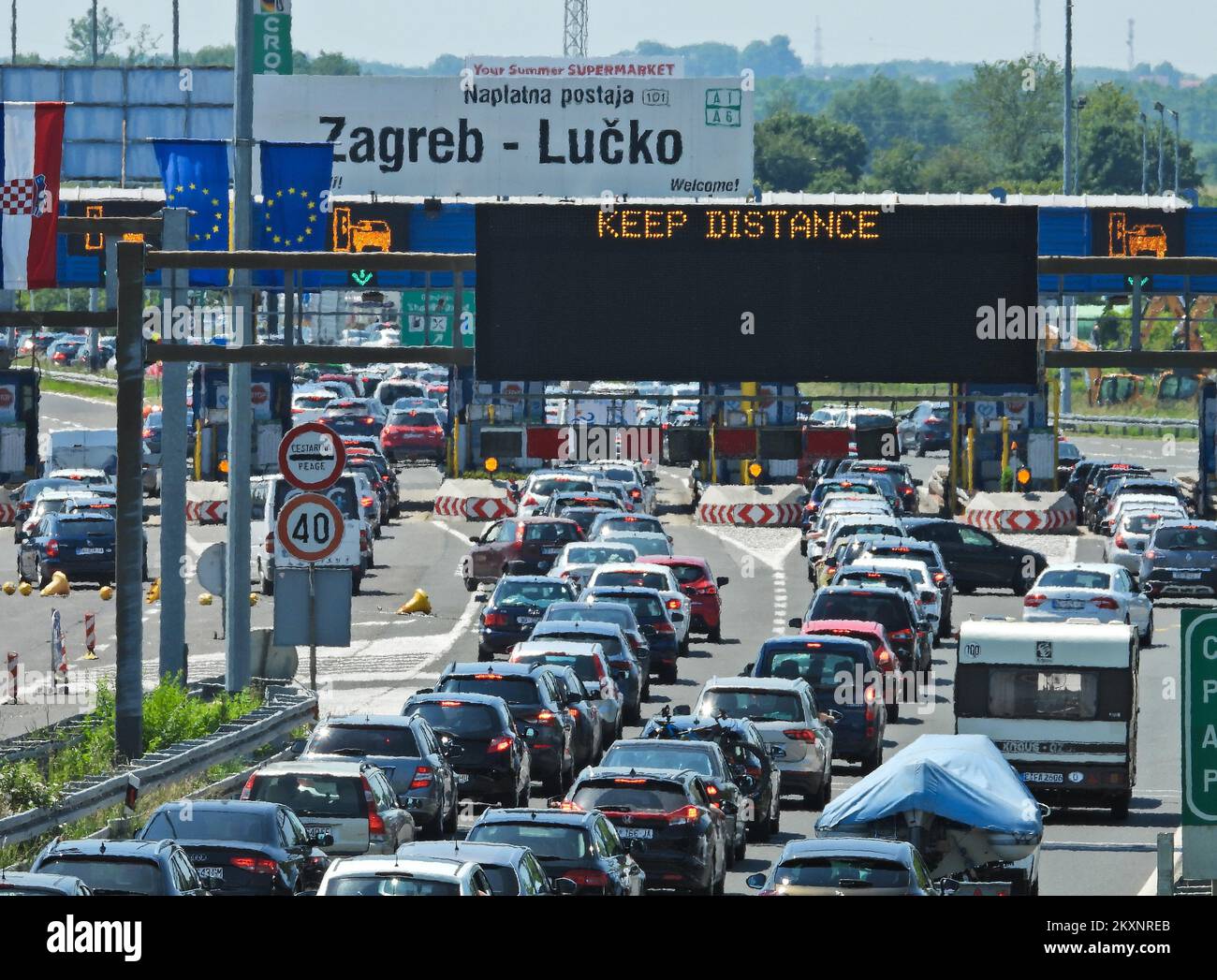 Cars line up in long tracffic jam to enter the A1 Croatia highway at ...