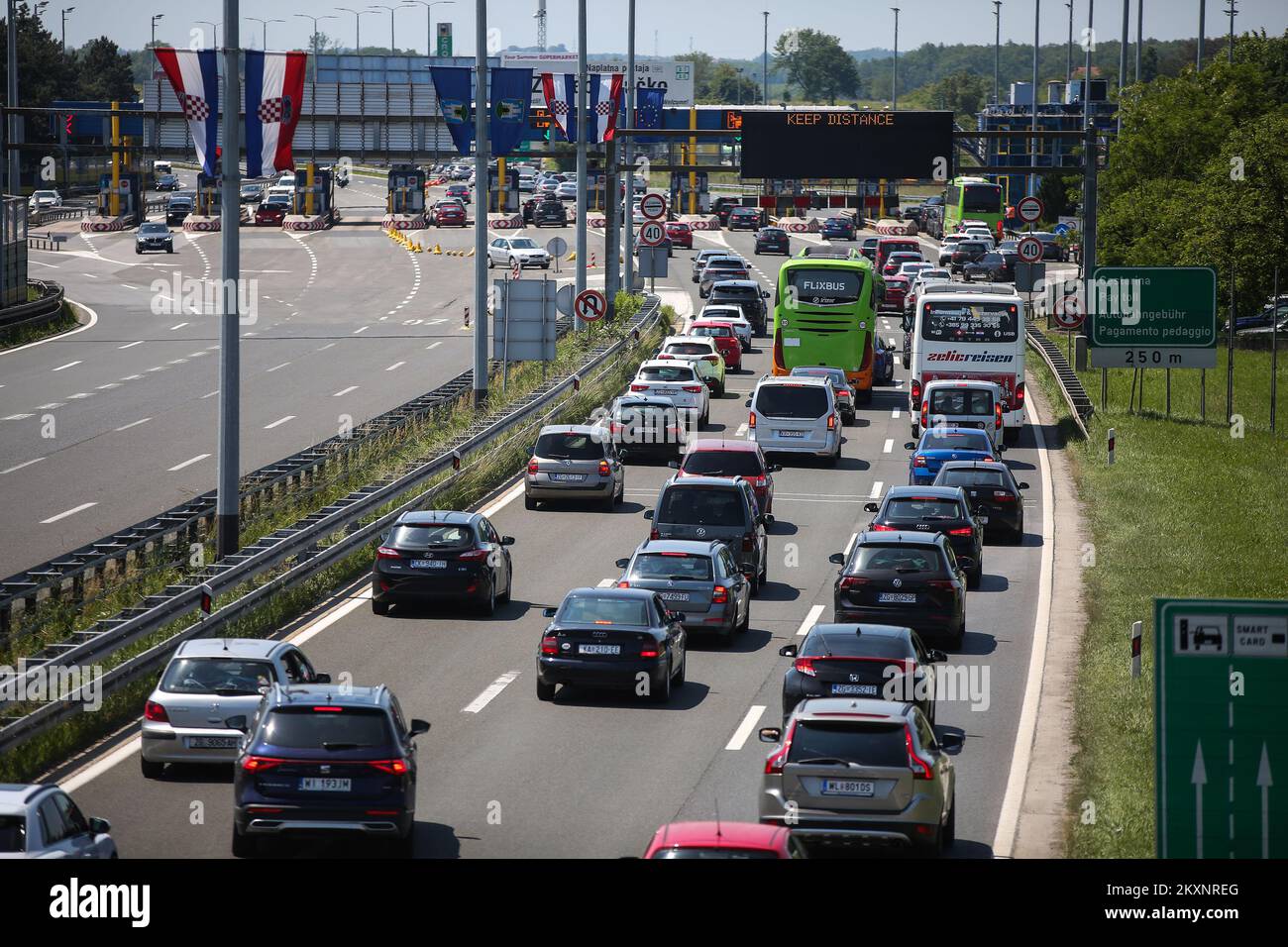 Cars line up in long tracffic jam to enter the A1 Croatia highway at ...