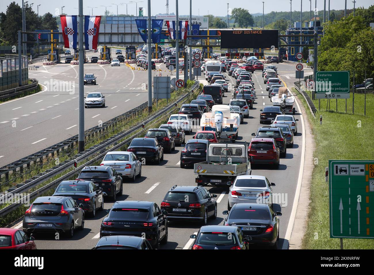 Cars line up in long tracffic jam to enter the A1 Croatia highway at ...
