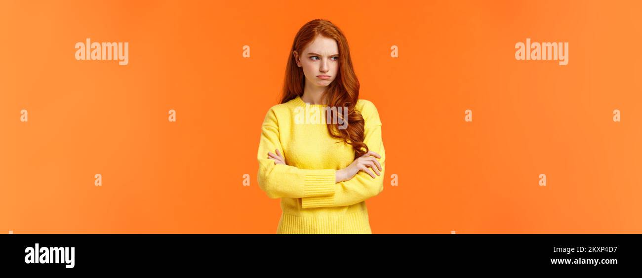 Offended angry and tensed woman with curly red hair, freckles, having ...