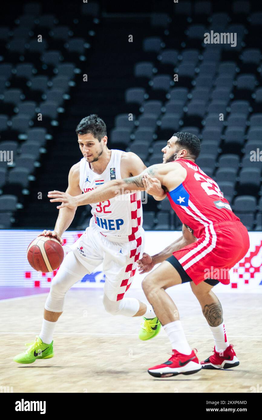 Roko Rogic of Croatia and Emmanuel Andujar Puerto Rico during friendly ...
