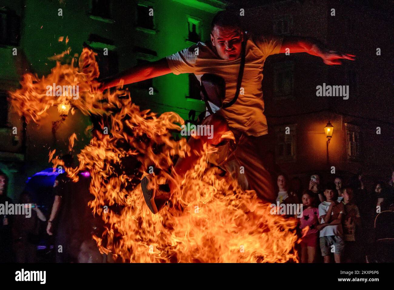 Children jumping through bonfire in Vodnjan, Croatia on 23. June 2021 ...