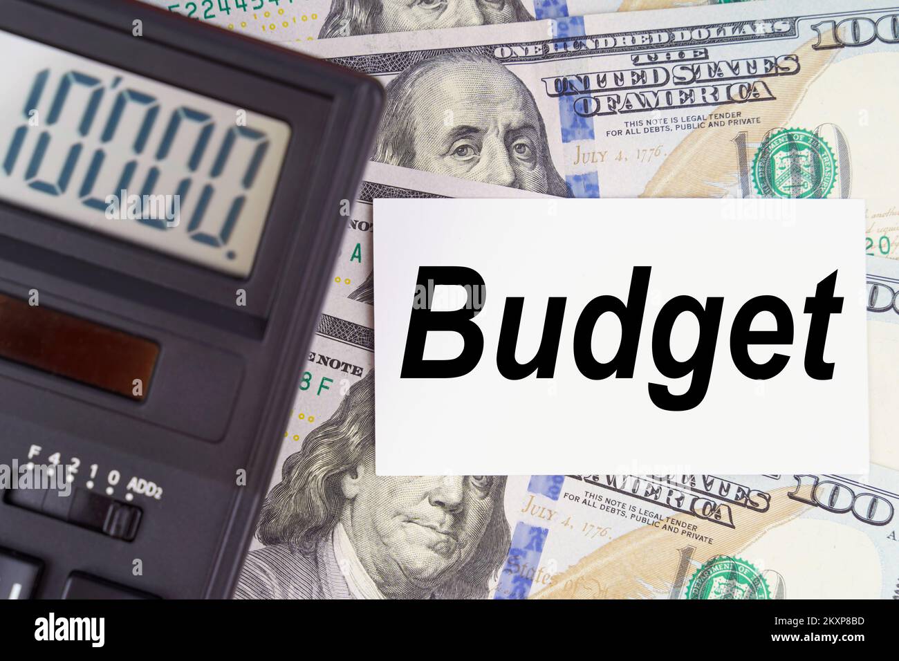 Business and finance concept. On the table are dollars, a calculator ...