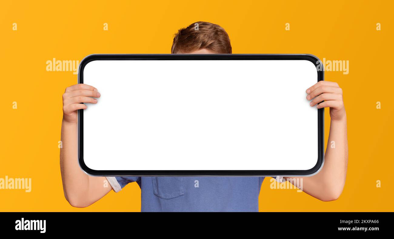 Mobile Ad. Teen Boy Hiding Face Behind Huge Blank Smartphone Stock ...