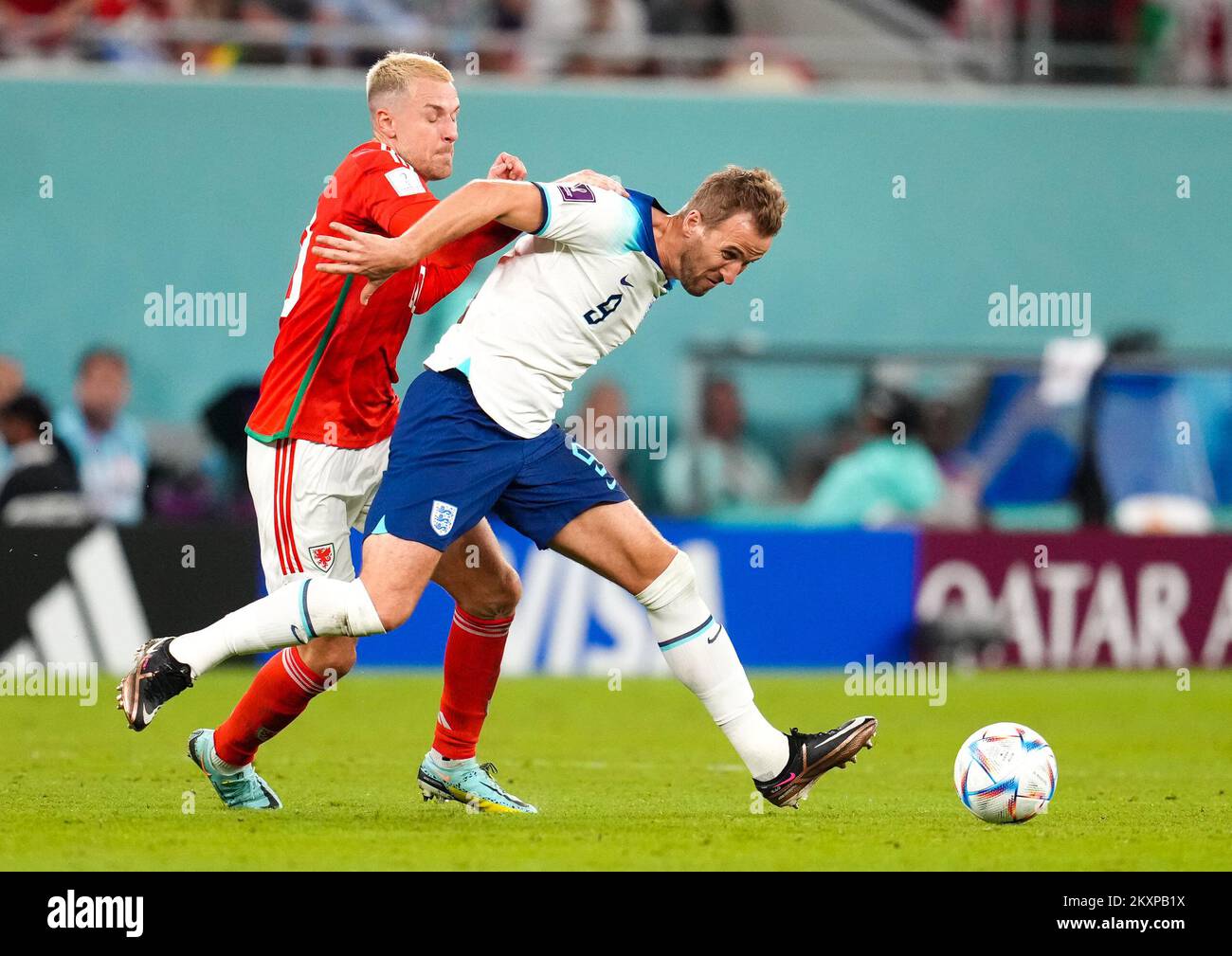 England's Harry Kane holds off Wales' Aaron Ramsey during the FIFA ...