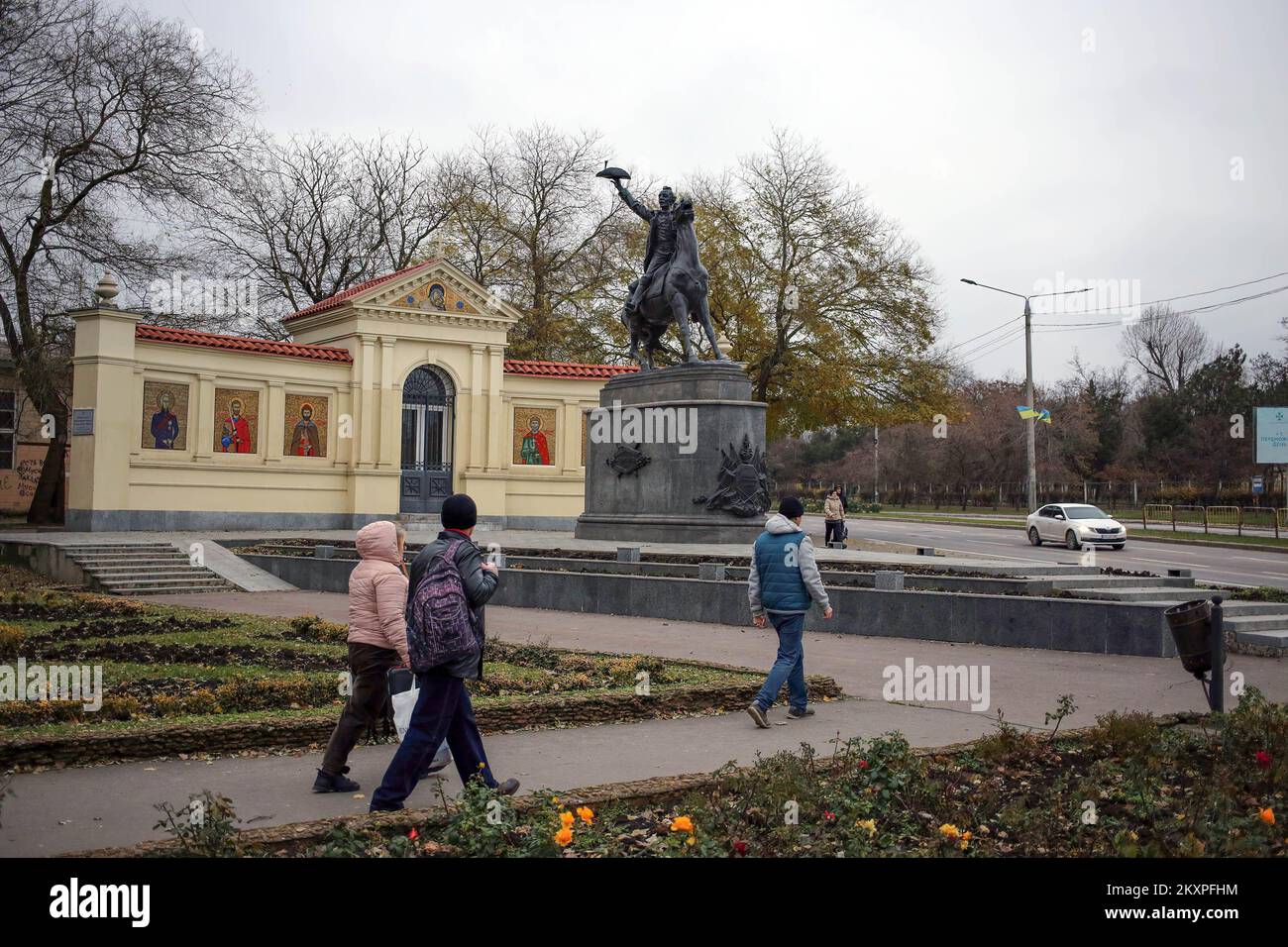 People are seen walking near the monument to A.V. Suvorov As part of ...