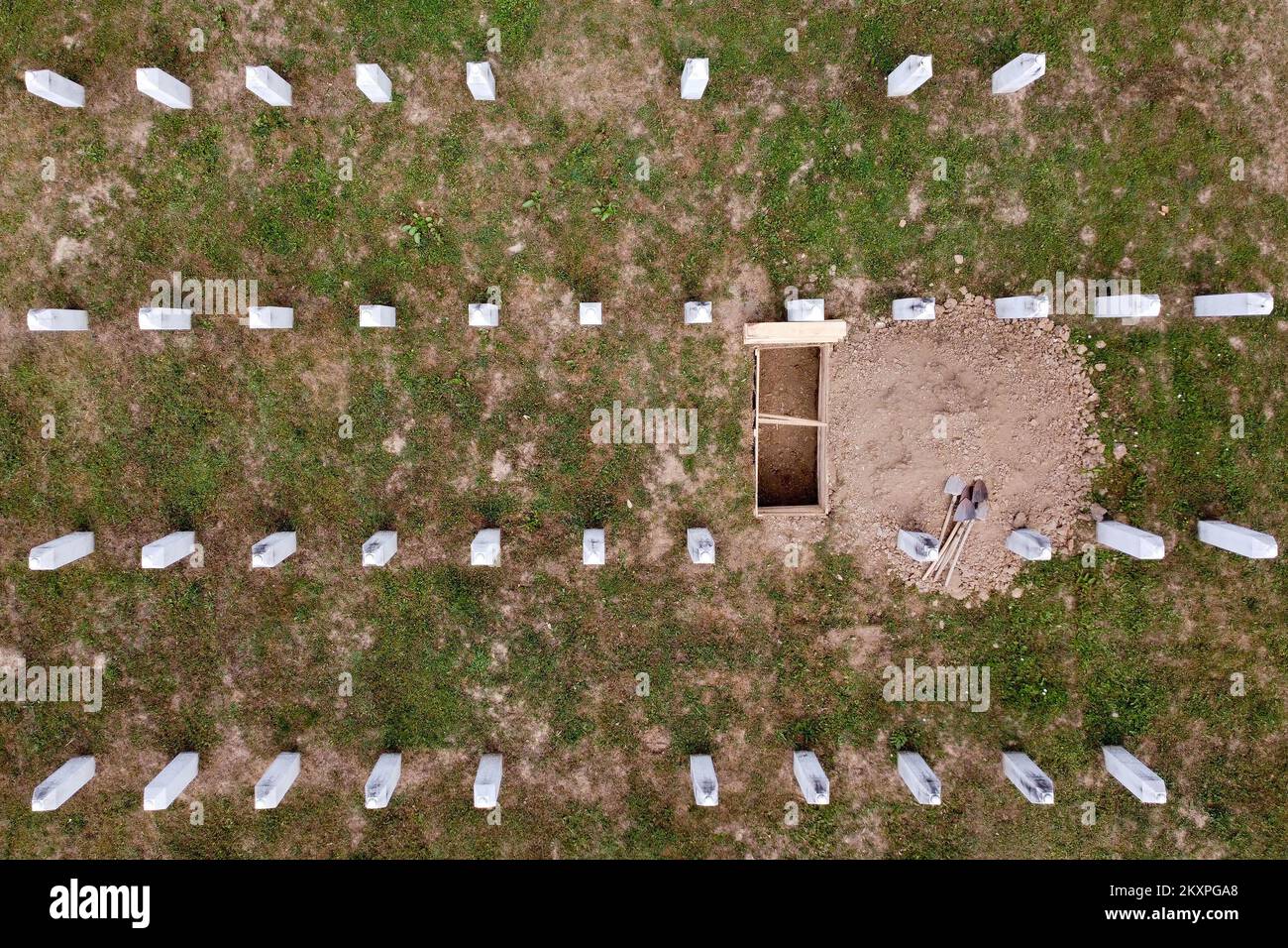 The excavation of the cemetery in which the remains of nineteen victims ...