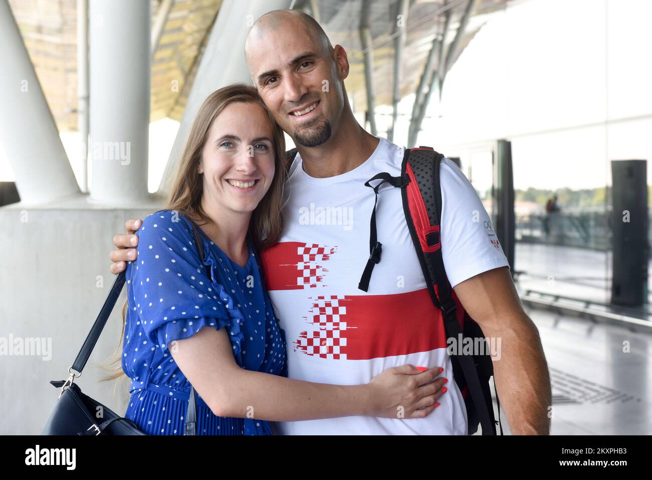 Croatian rower Martin Sinkovic with his wife Manuela pose for photo at ...