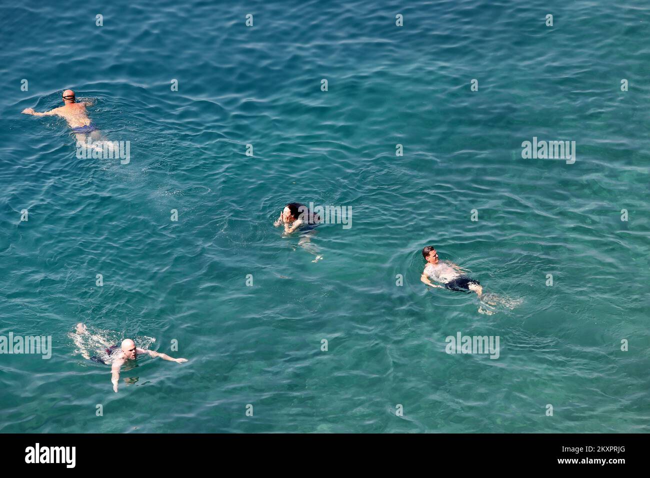 Swimmers enjoy in Sablicevo beach in Rijeka on July 24, 2021. Sablicevo ...