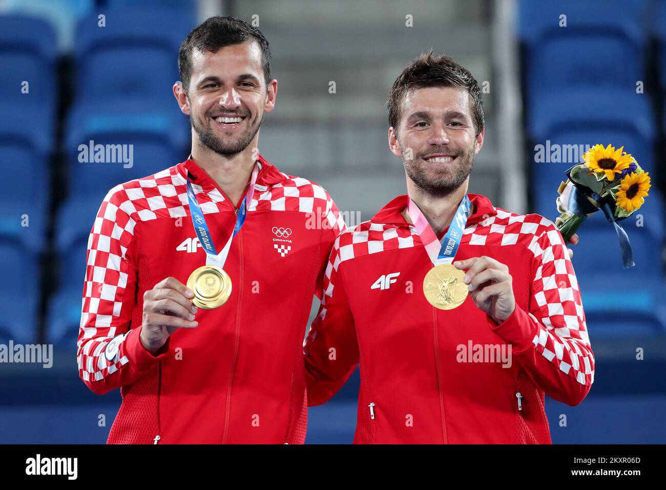 (L-R) Gold medalists Mate Pavic of Team Croatia and Nikola Mektic of ...