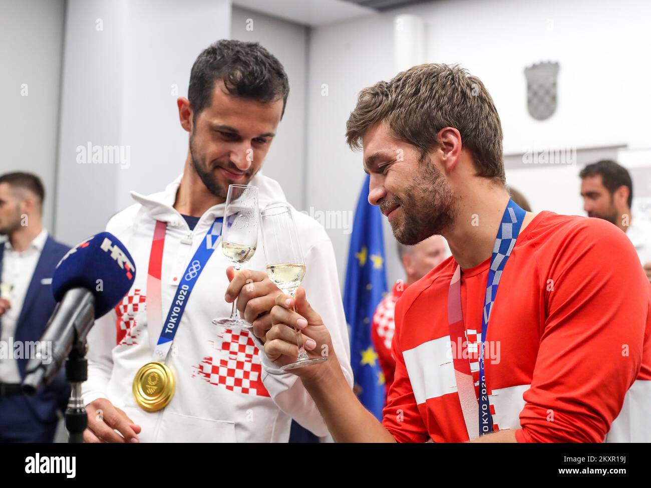Croatian tennis players, olympic golden medalists Mate Pavic (L) and ...